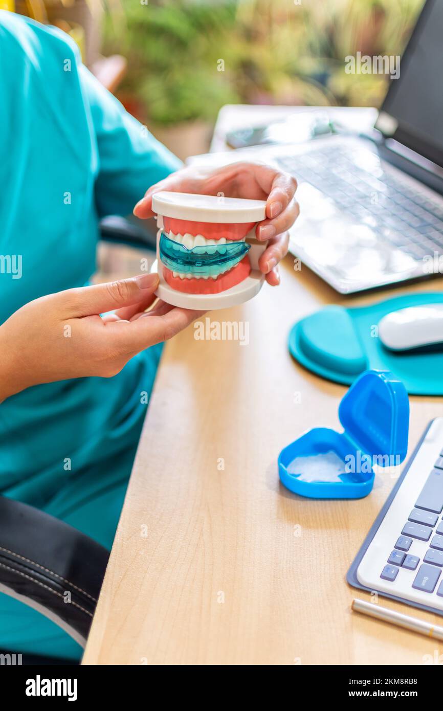 A vertical shot of a dentist consultation, dental brace, or teeth ...