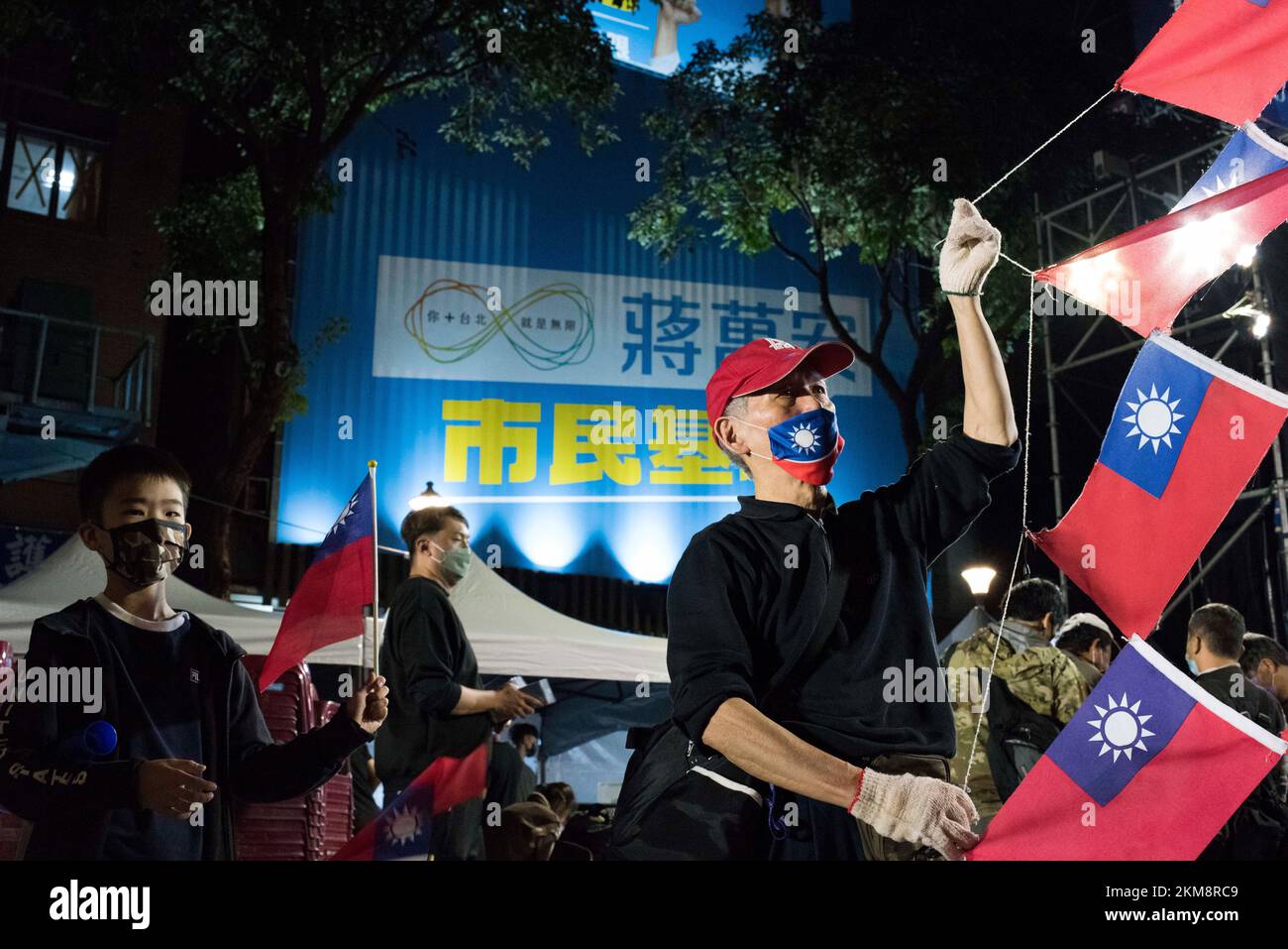 November 26, 2022, Taipei, N/A for Taiwan, Taiwan: A man holds up ...