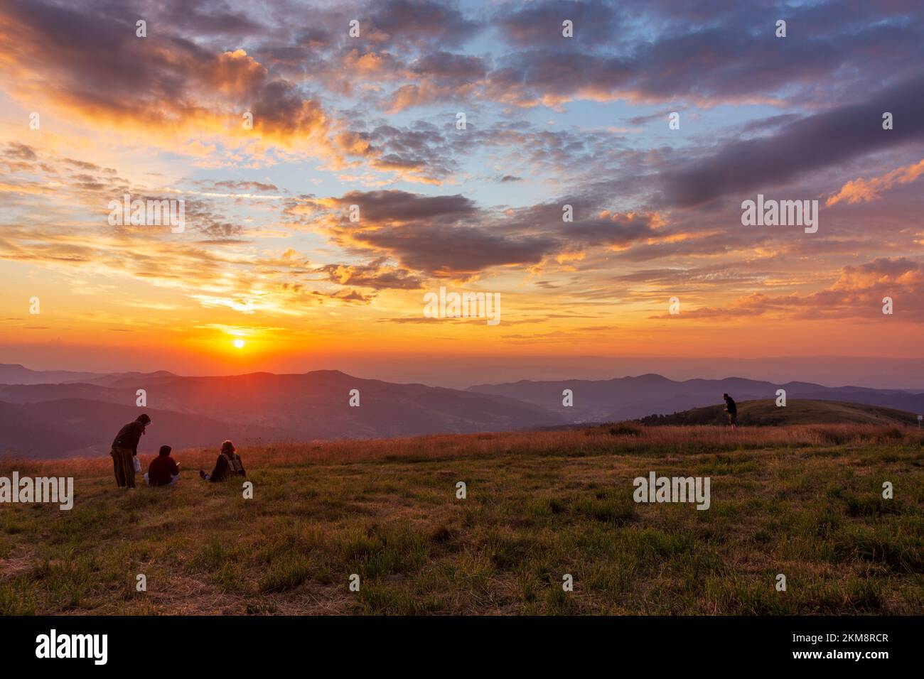 Vosges (Vogesen) Mountains: people at sunrise at summit Hohneck, view ...