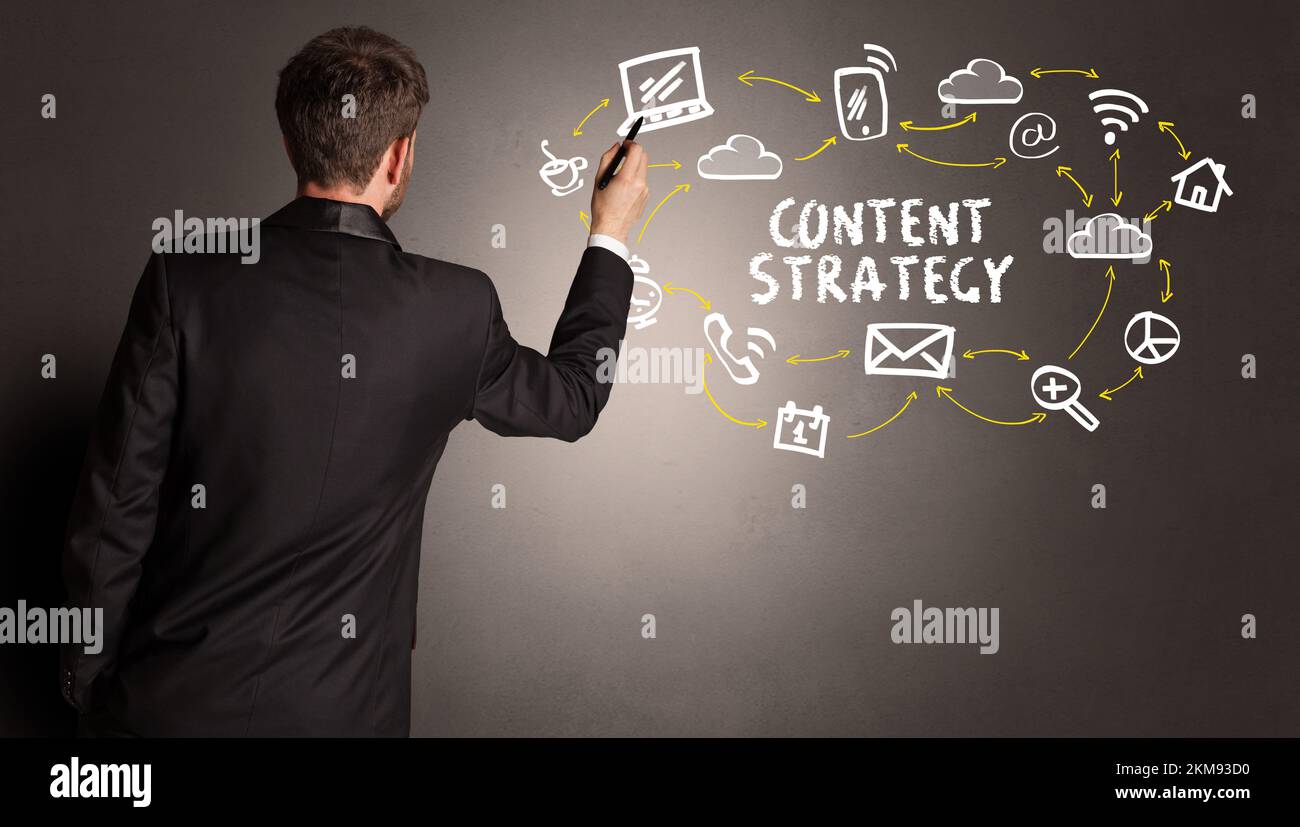 businessman drawing social media icons Stock Photo - Alamy