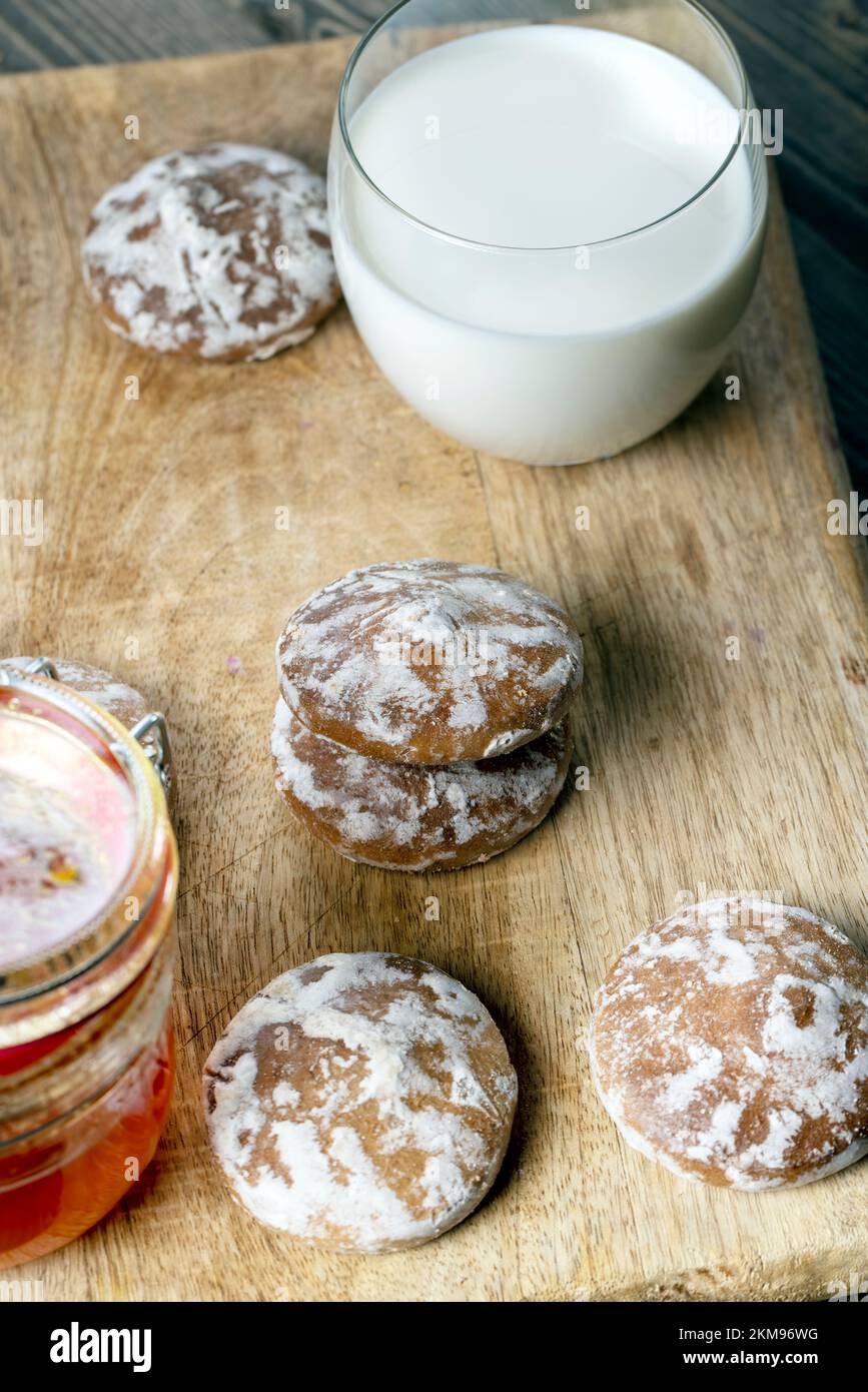 iced sugar gingerbread on a cutting board, flour pastry made of ...