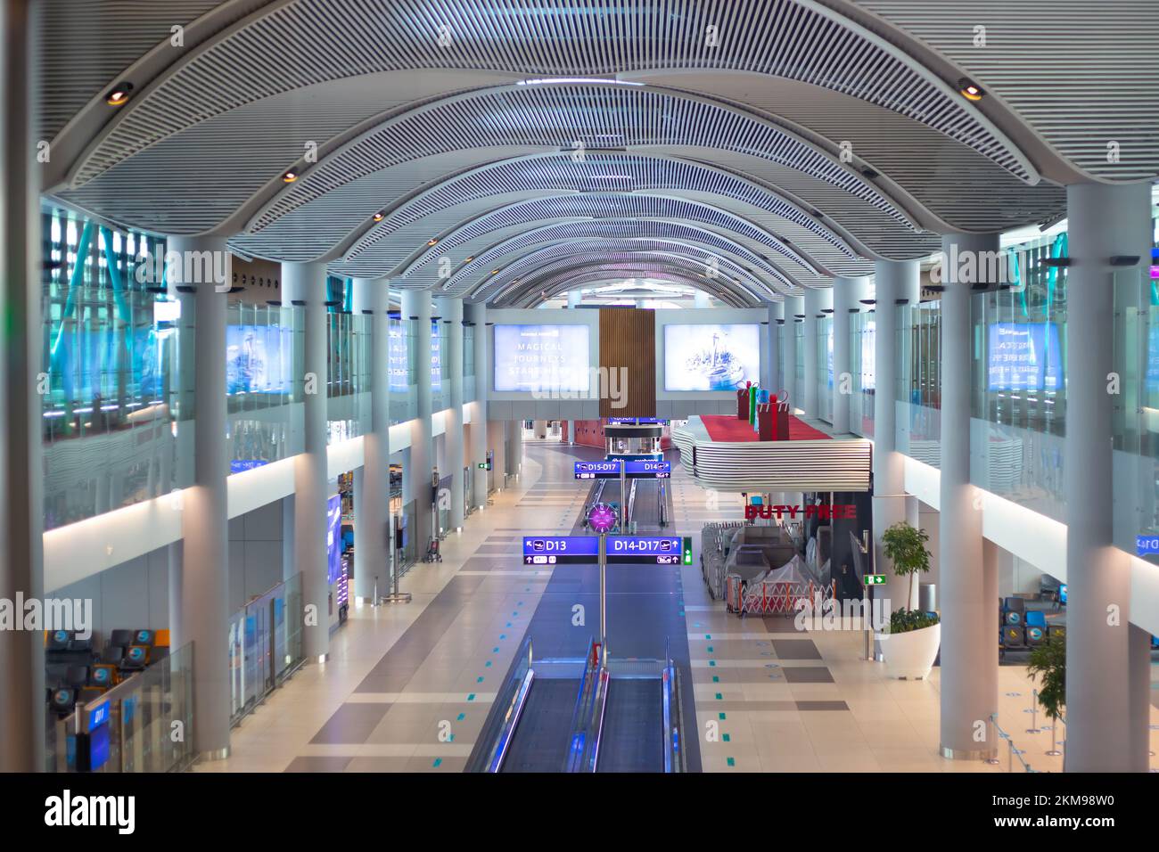 The airport building inside with signs of the directions of departure ...