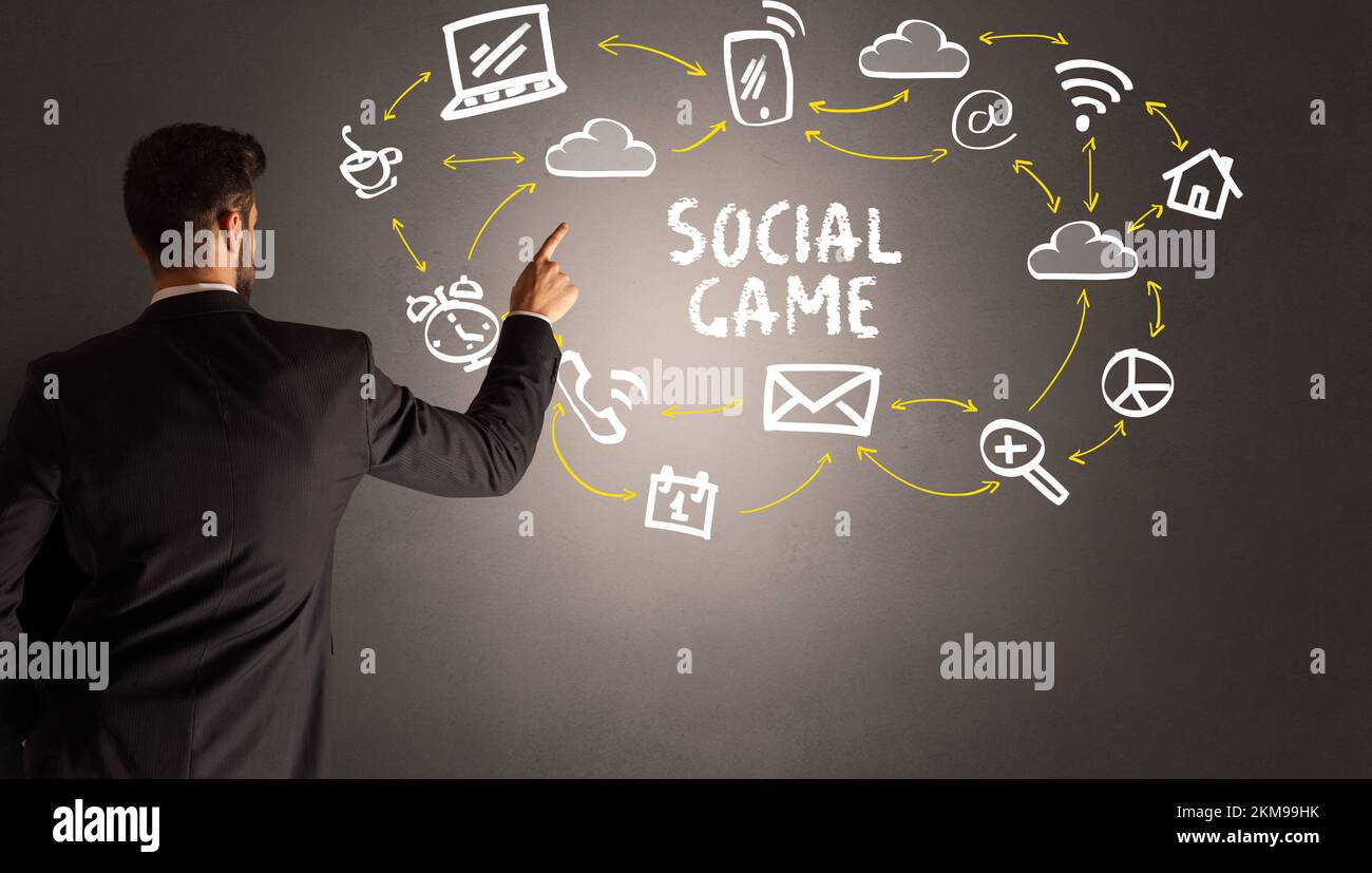 businessman drawing social media icons Stock Photo - Alamy