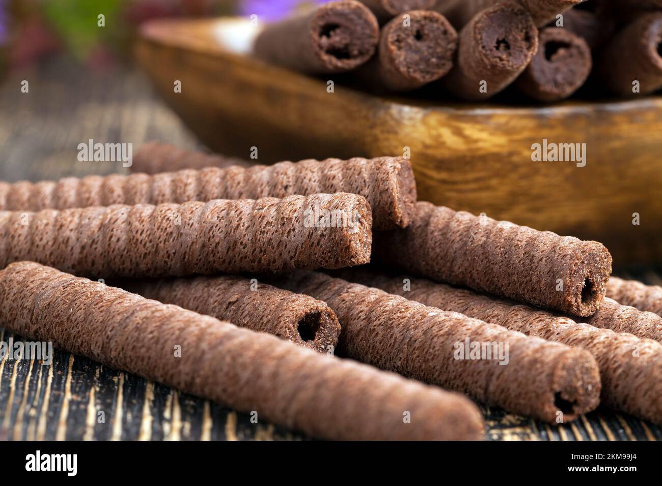 chocolate tubes with chocolate filling, dessert of chocolate waffle ...
