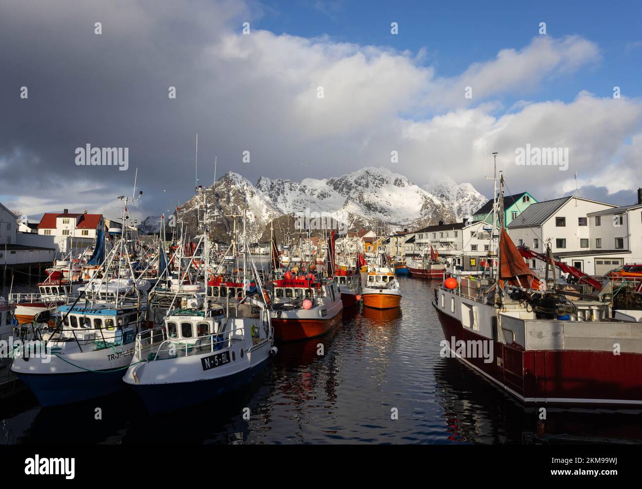 Cod fishing boats in Henningsvaer harbour Stock Photo - Alamy