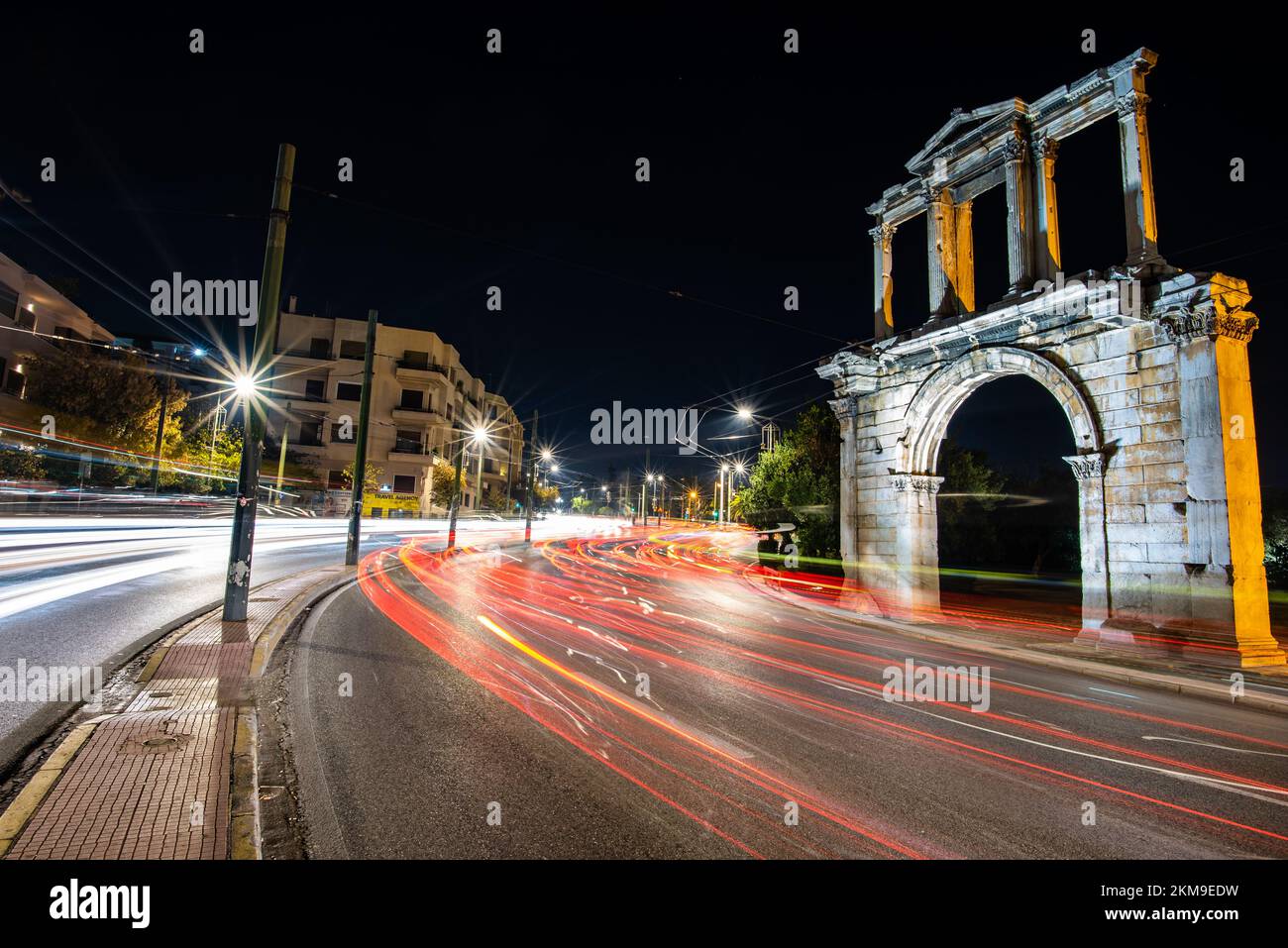 Night shot of traffic around Hadrian's Arch, Athens, Greece Stock Photo ...