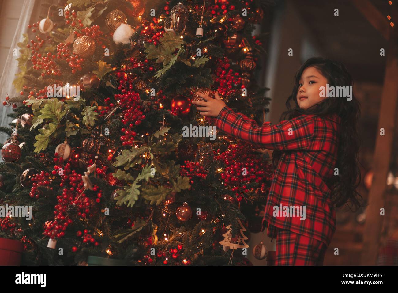 Happy cute japan little girl dreamer waiting miracle from Santa posing ...