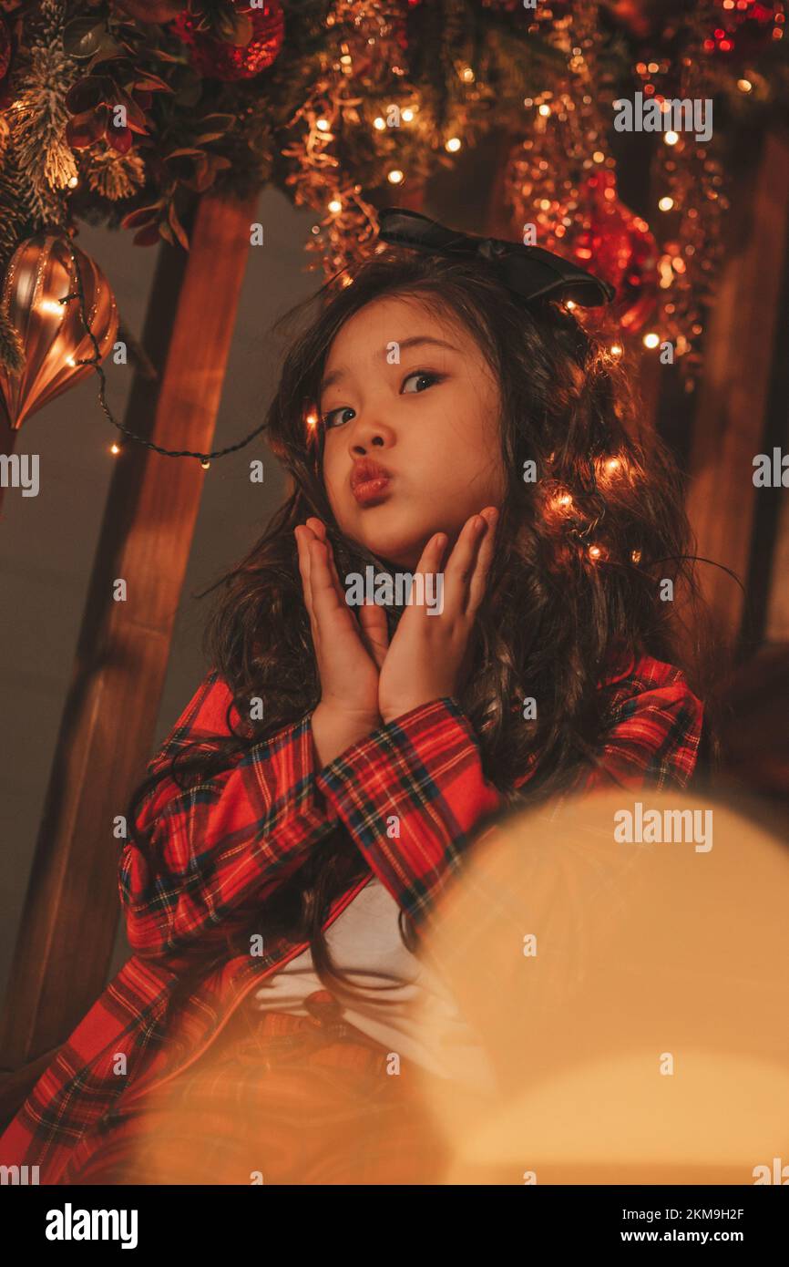 Happy japan little girl dreamer waiting miracle from Santa posing on ...