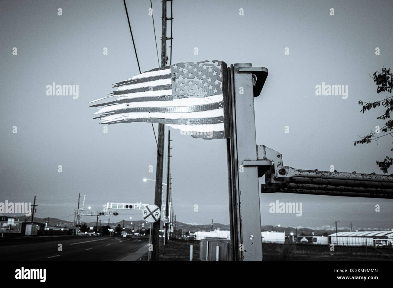 Black and white American Flag in rustic town Stock Photo - Alamy
