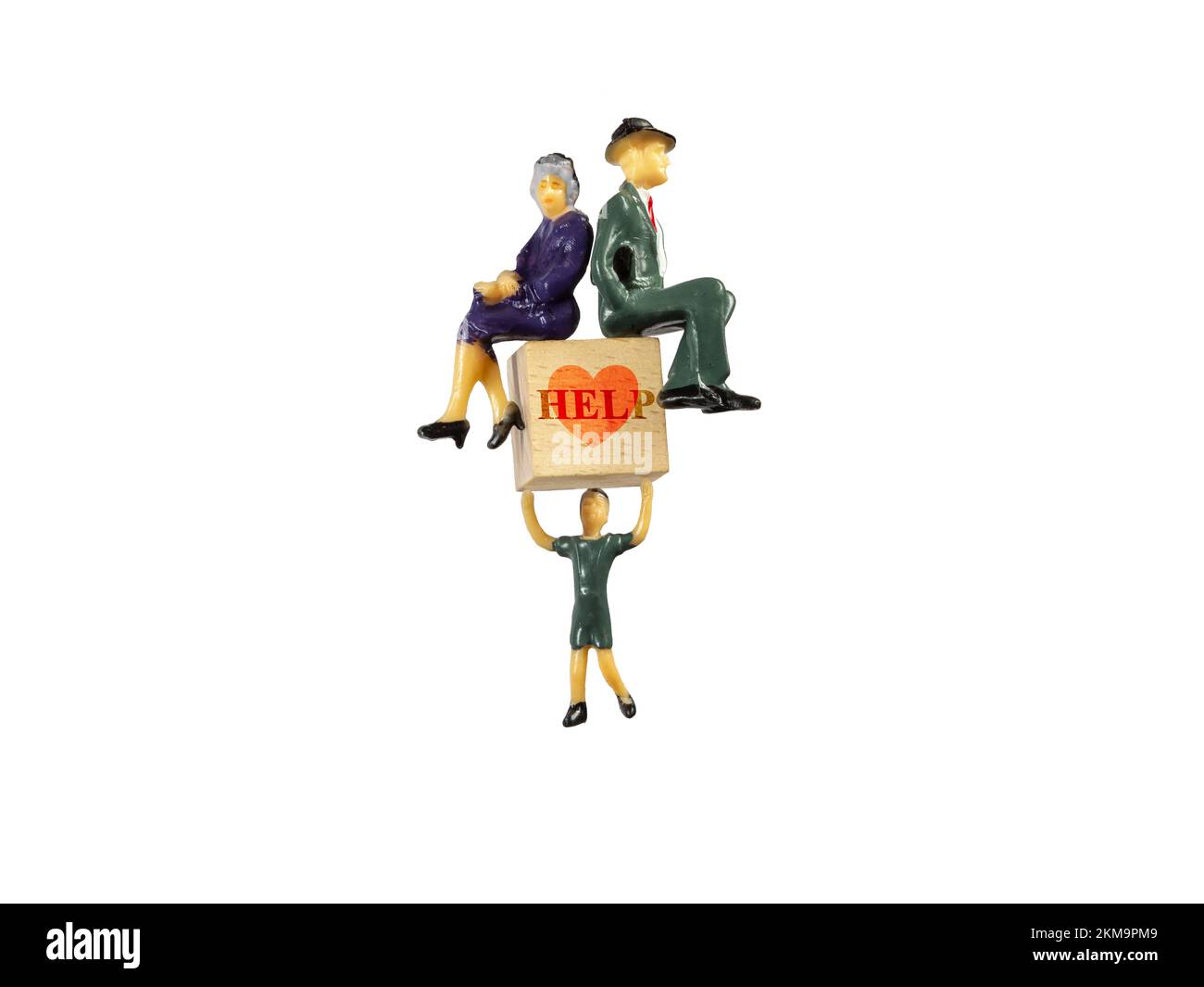 Two figures sitting on box with a red heart and help held by a small ...