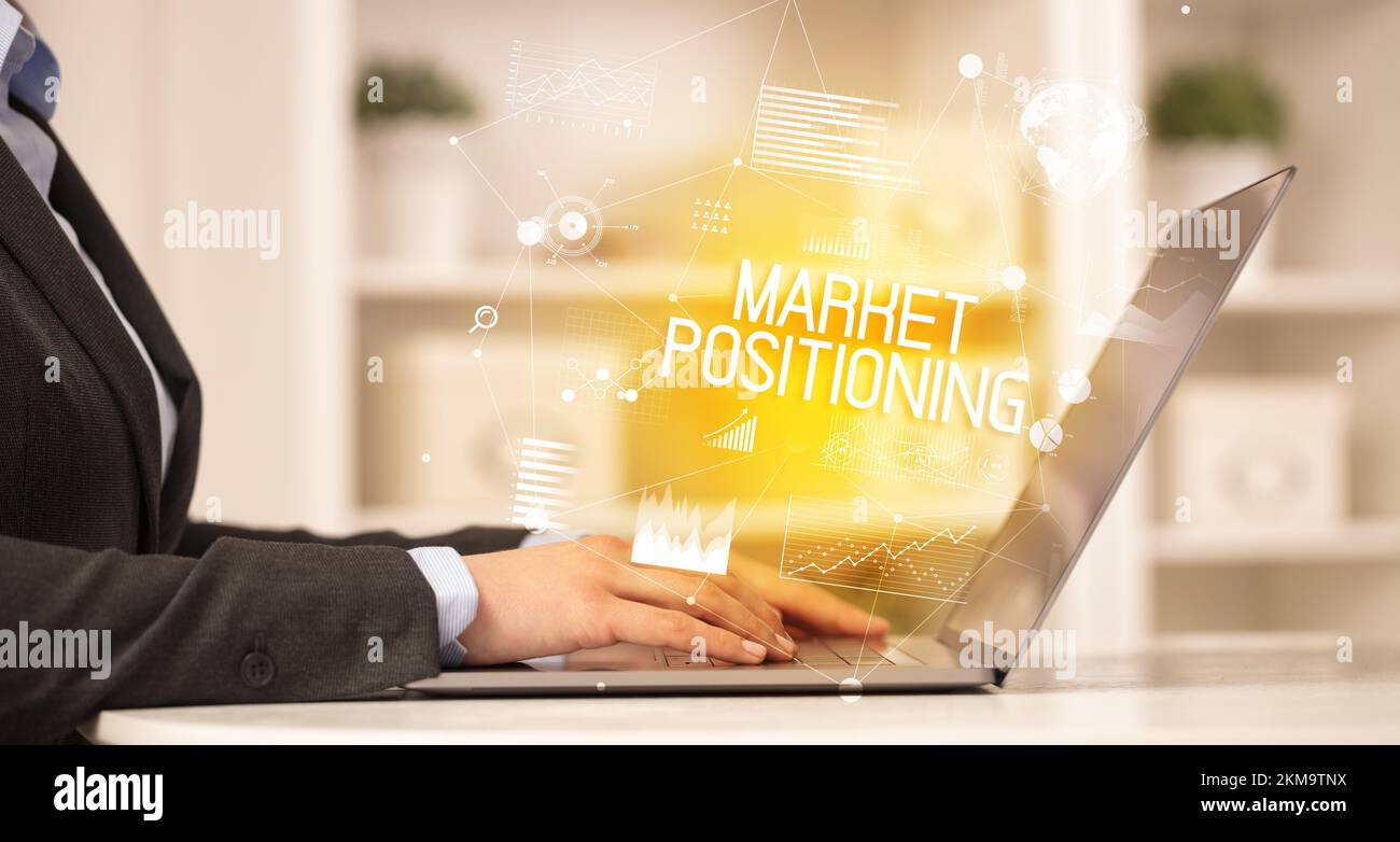 Side view of a business person working on laptop Stock Photo - Alamy