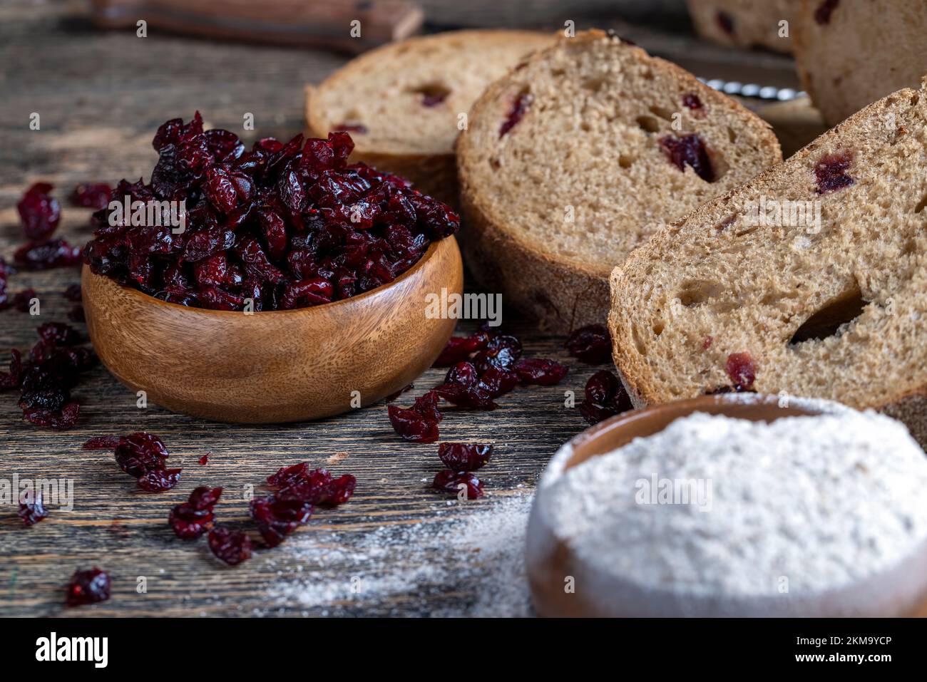 fresh cut bread made of flour and dried cranberries, red cranberry ...