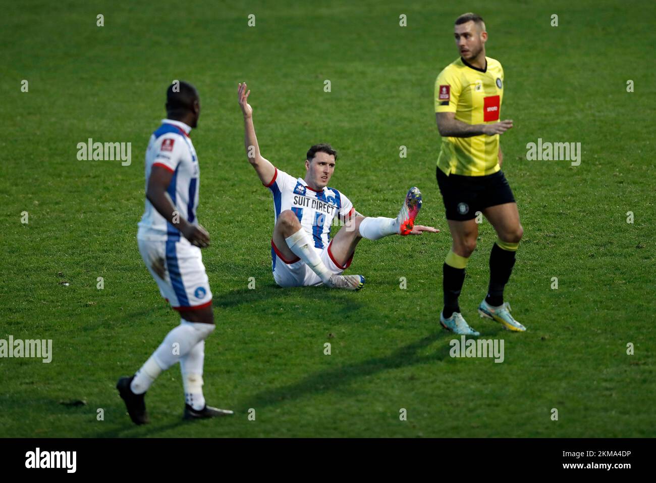 Hartlepool United’s Callum Cooke (centre) reacts after being fouled ...