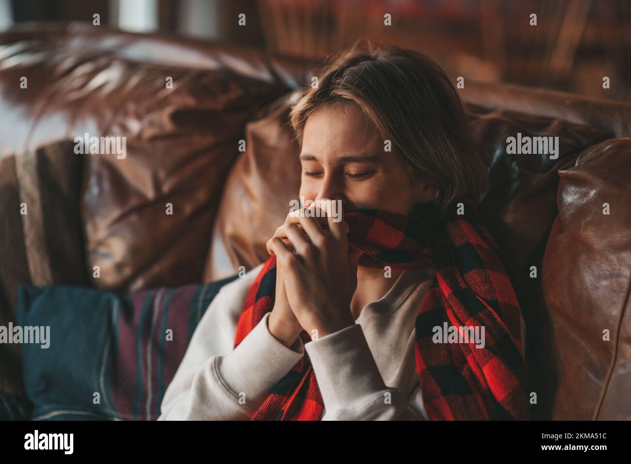 Young emotional cheerful teen boy with long hair laughter and joyful at ...