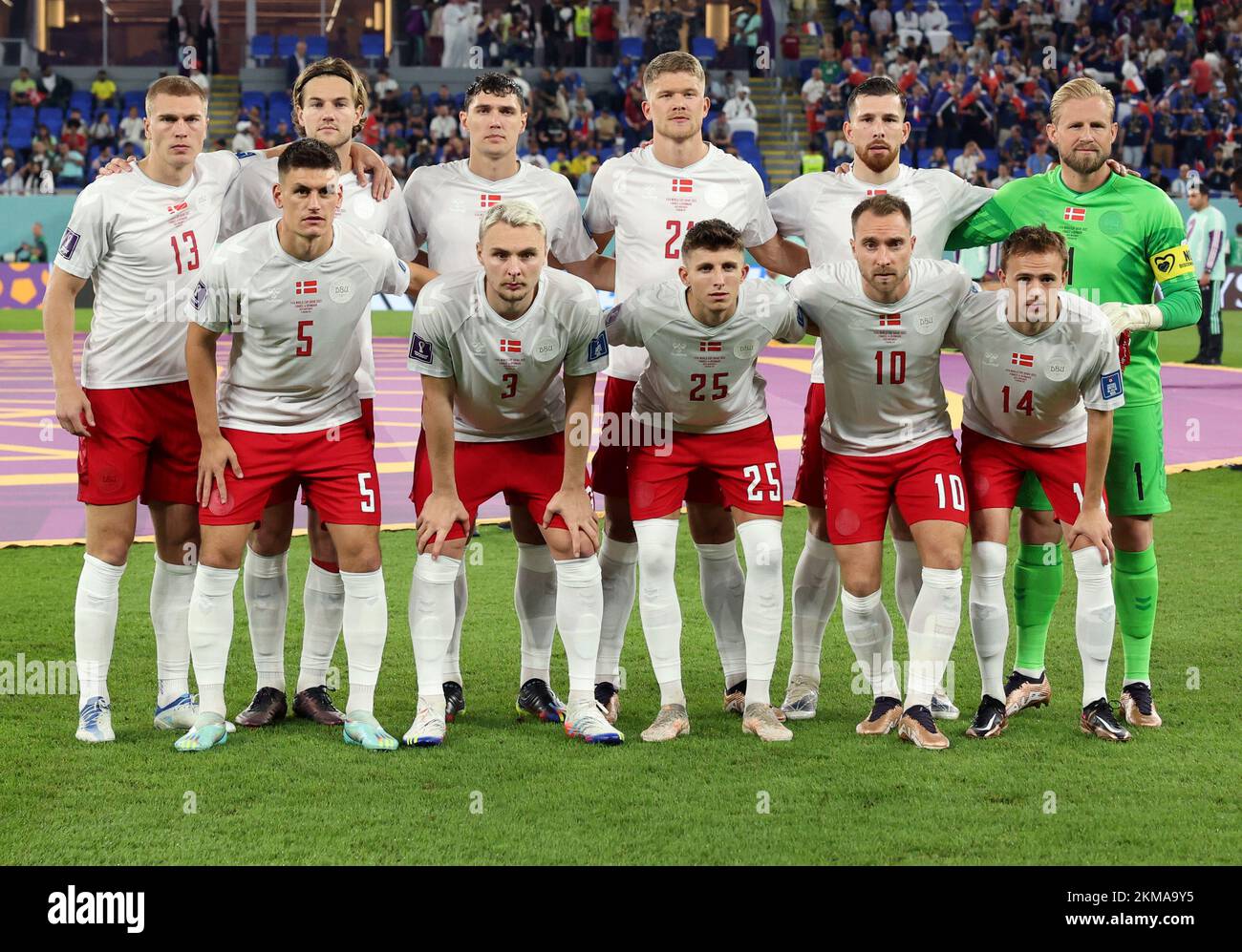 Doha, Qatar. 26th Nov, 2022. Players of Denmark line up before the ...
