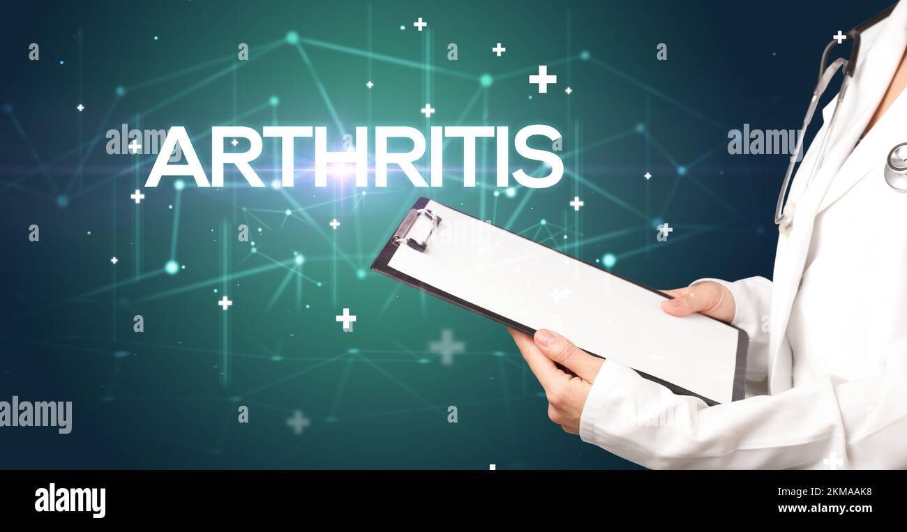 Doctor fills out medical record Stock Photo - Alamy