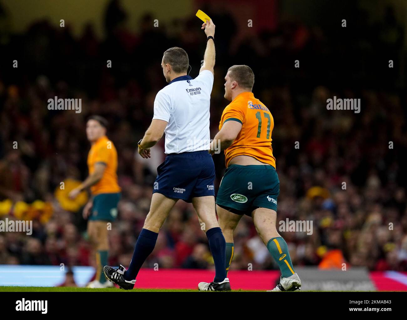 Australia's Tom Robertson (right) is shown a yellow card by referee ...