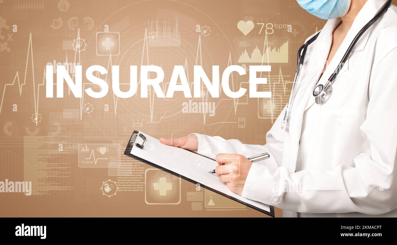 young doctor writing down notes Stock Photo - Alamy