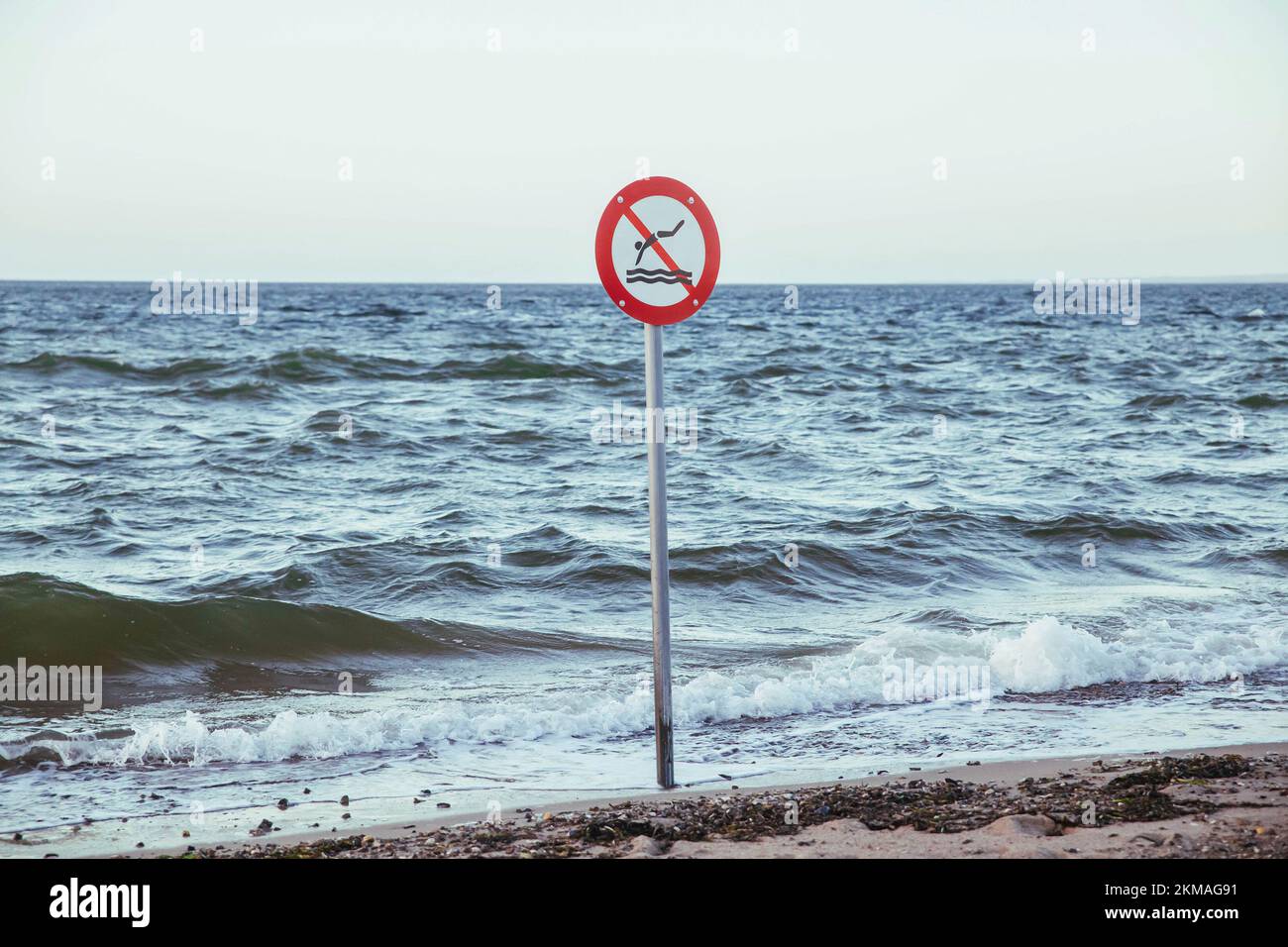 Sign prohibiting swimming in the North Sea in Denmark Stock Photo - Alamy