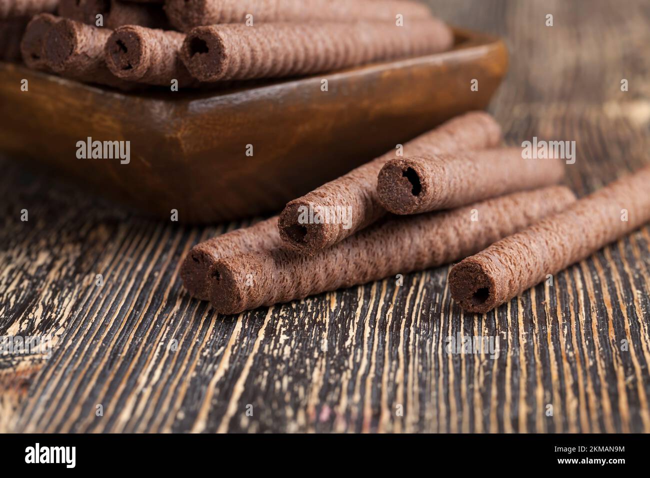 chocolate tubes with chocolate filling, dessert of chocolate waffle ...