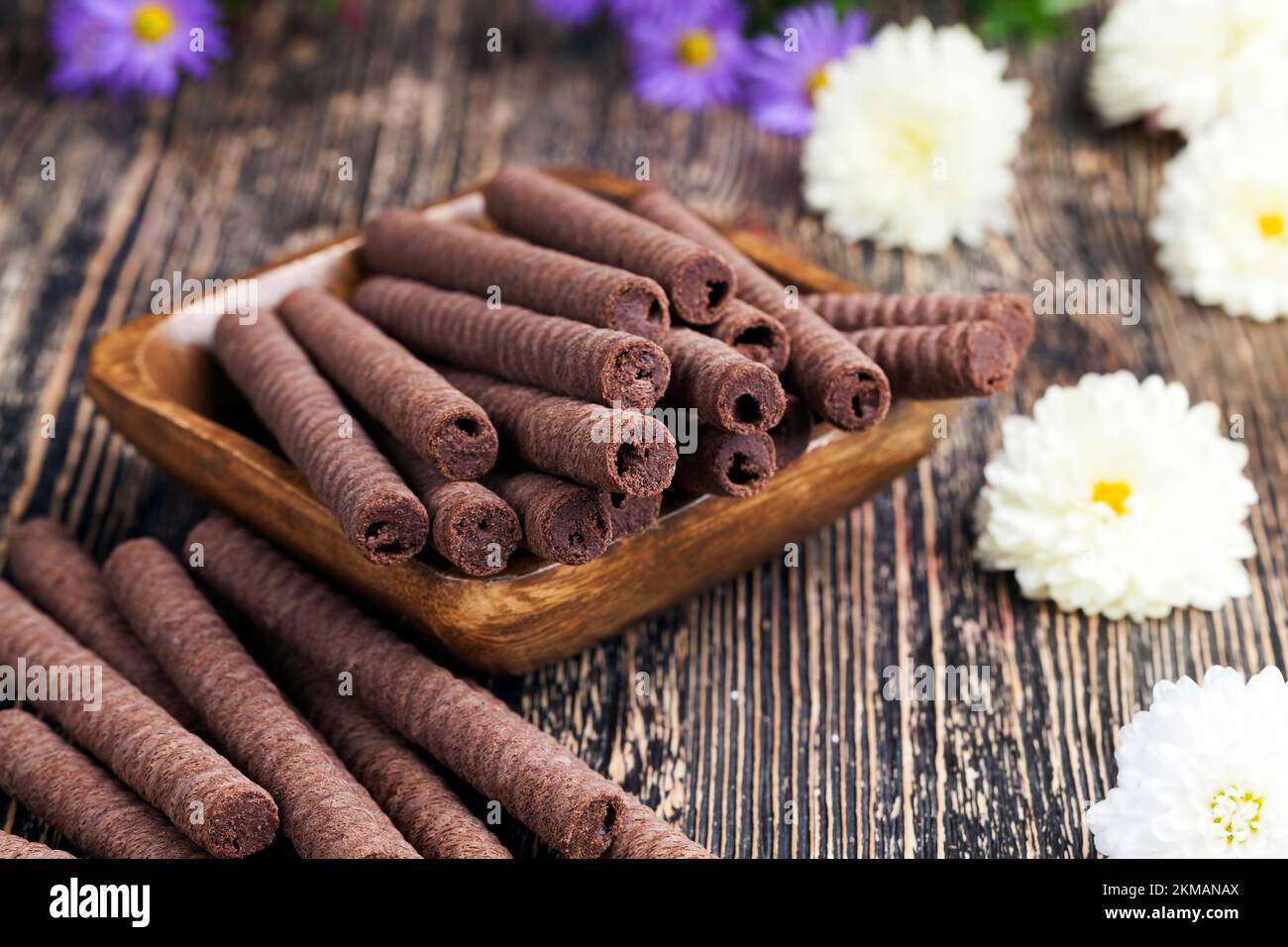 chocolate tubes with chocolate filling, dessert of chocolate waffle ...