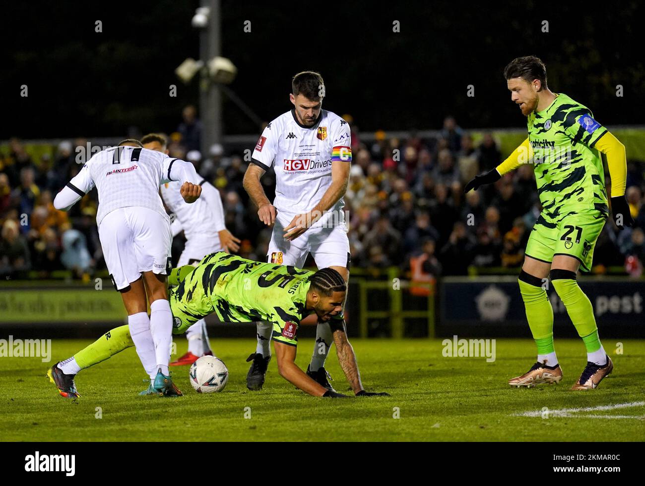 Forest Green Rovers' Myles Peart-Harris (second left) goes down after a ...