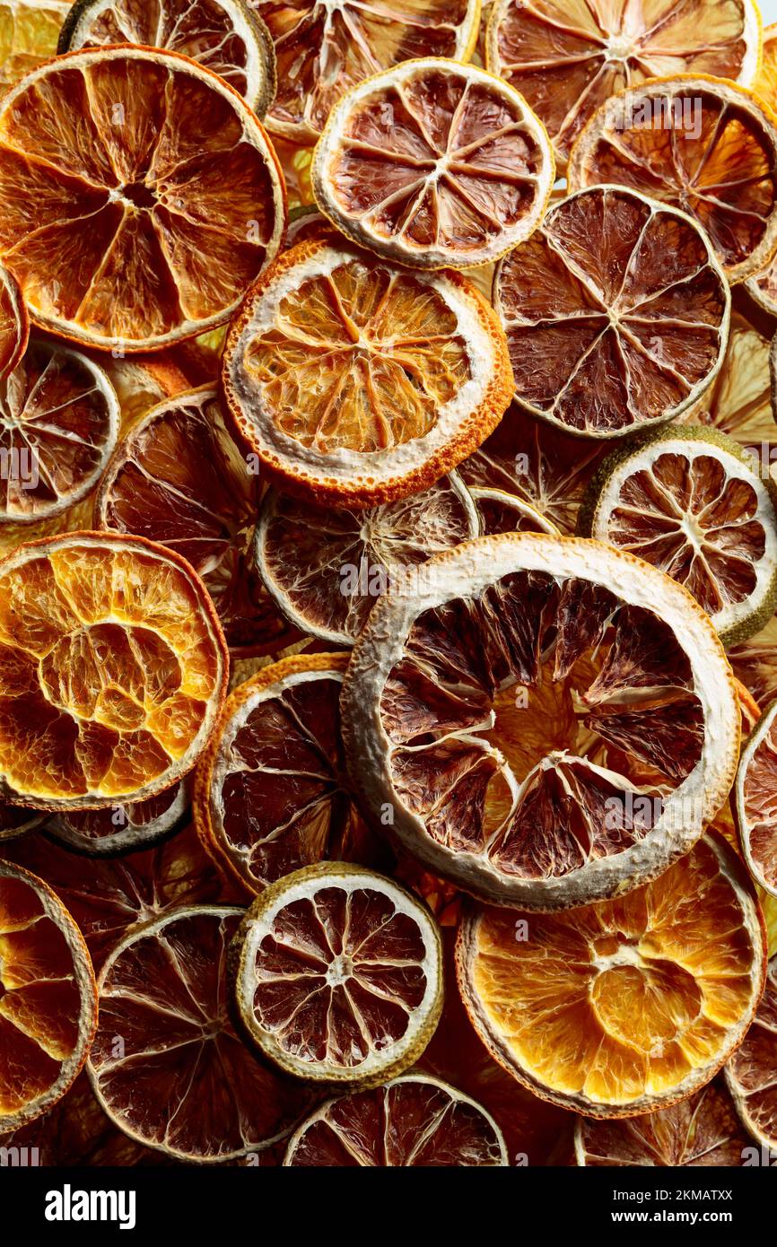 Dried citrus background. Dehydrated crispy fruit slices. Healthy meal ...