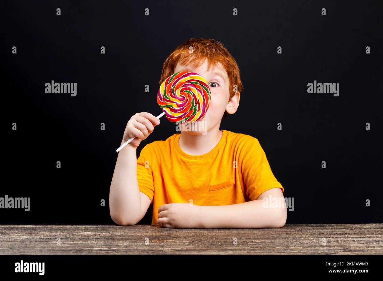 close up portrait of a boy with red hair who has a very sweet multi ...