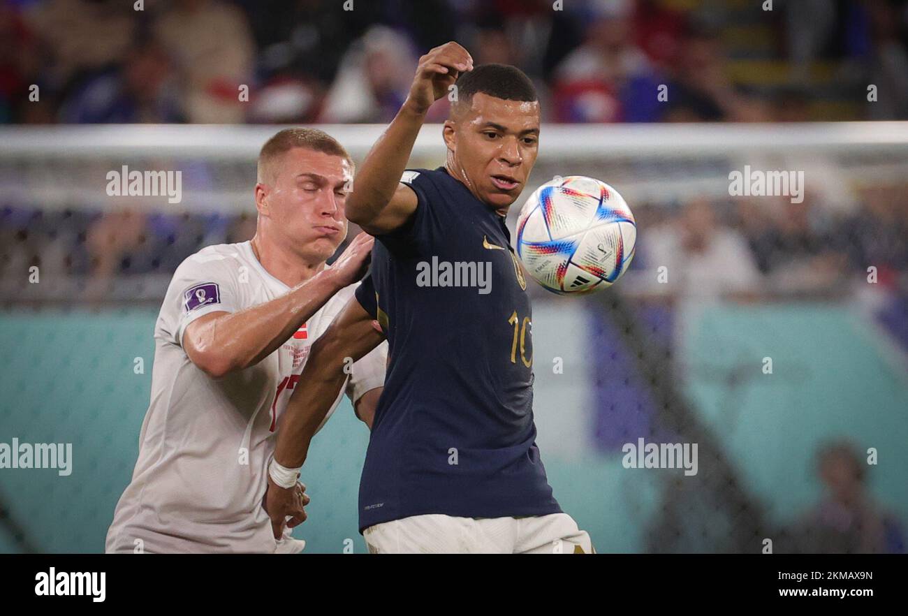 Danish Rasmus Kristensen and France's Kylian Mbappe fight for the ball ...