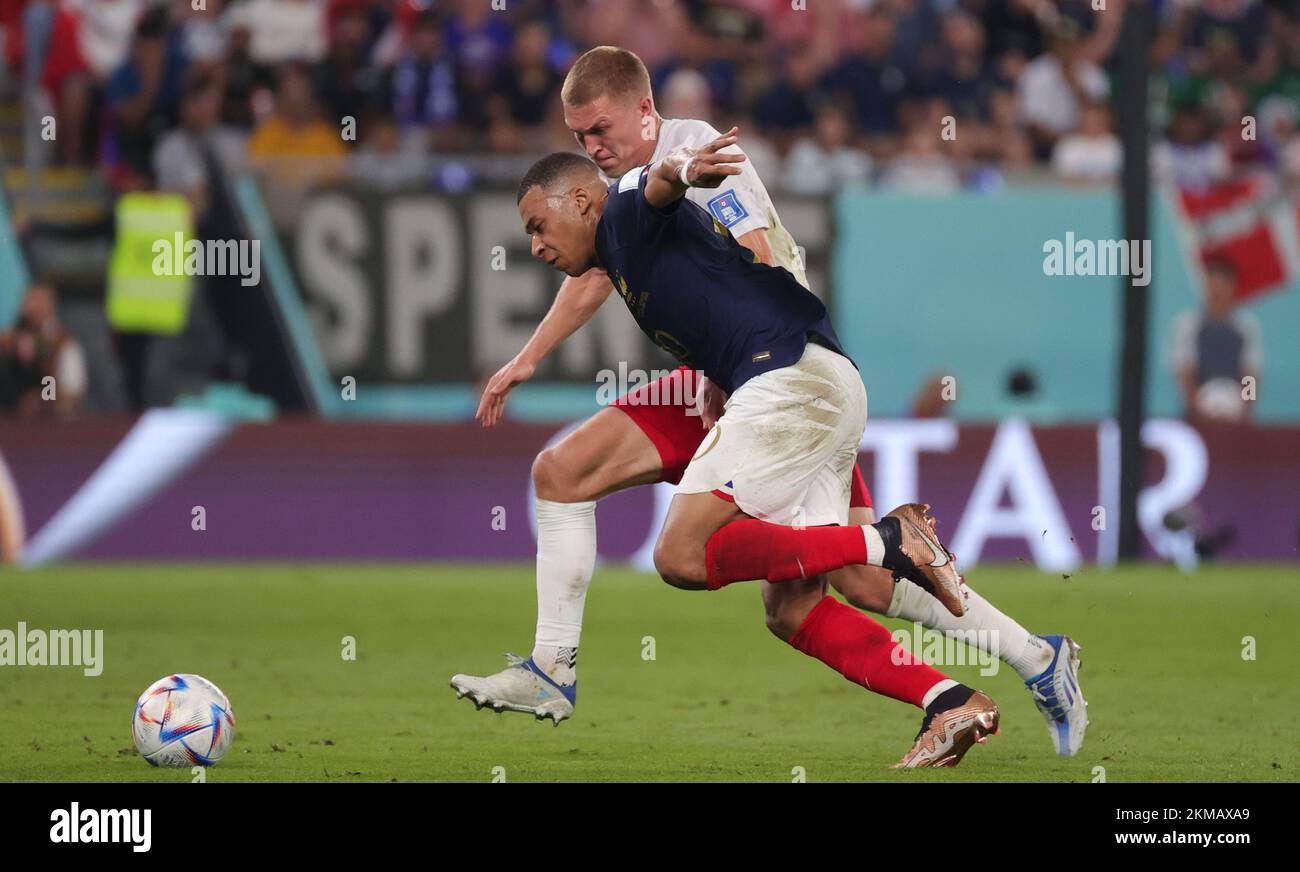 Danish Rasmus Kristensen and France's Kylian Mbappe fight for the ball ...