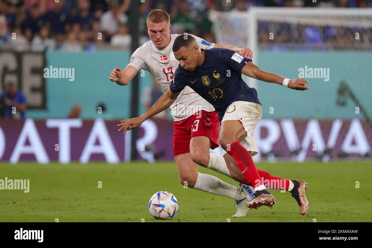 Danish Rasmus Kristensen and France's Kylian Mbappe fight for the ball ...