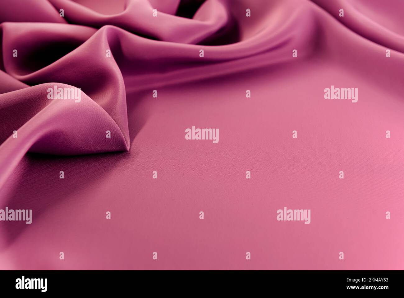 A piece of purple, red cloth. Fabric texture for background and design ...