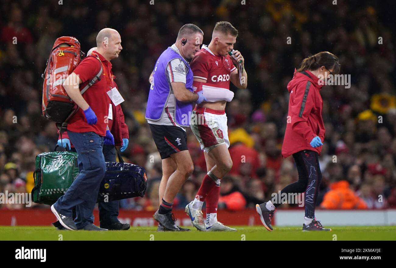 Wales' Gareth Anscombe leaves the pitch with an injury during the ...