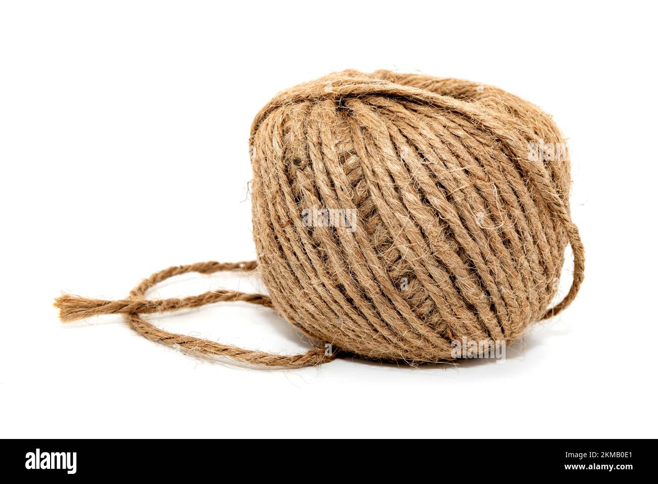 A ball of rope on a white background close-up. Harness. Jute. Twine ...