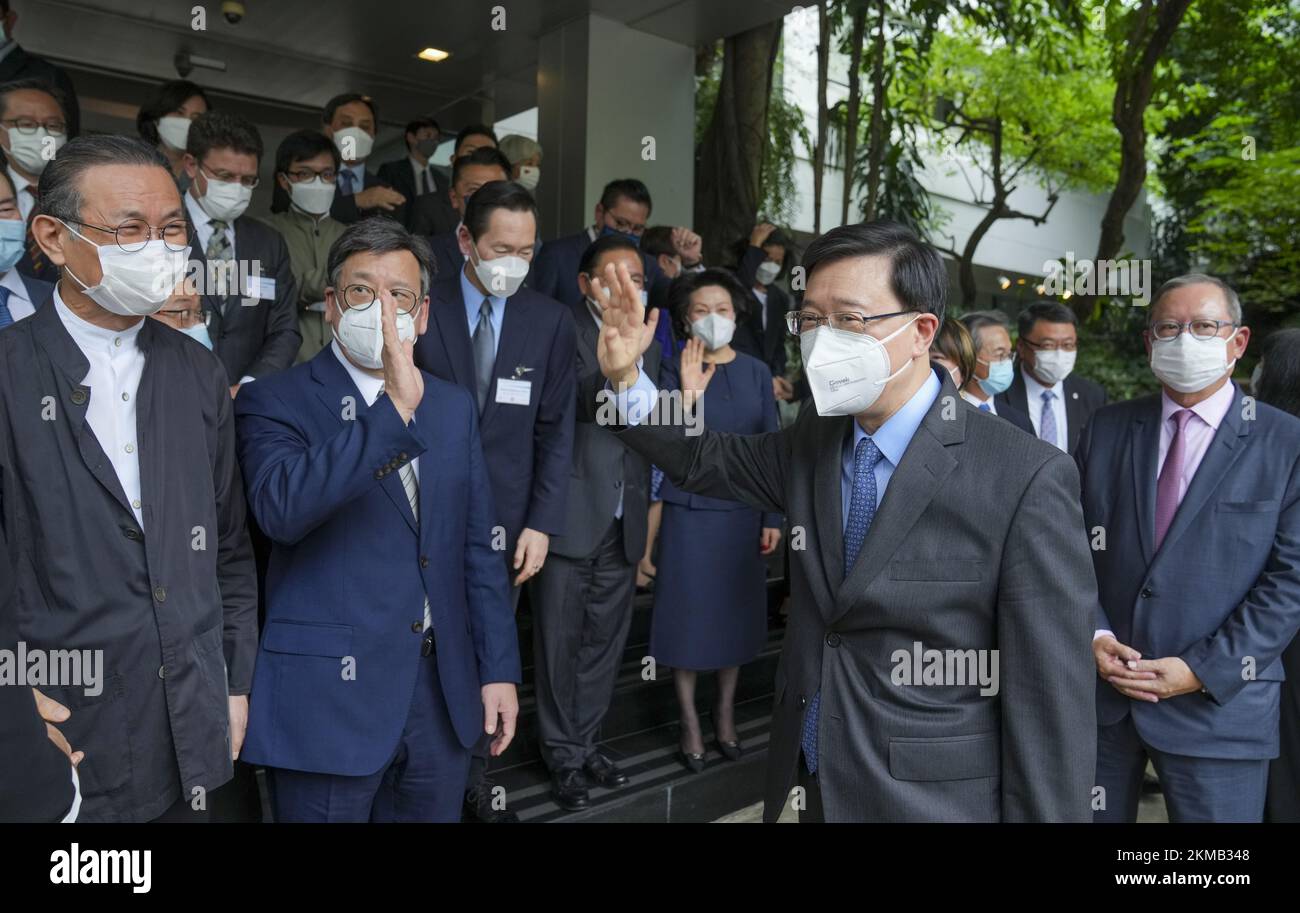 Chief Executive John Lee Ka-chiu meets the press with members of the ...