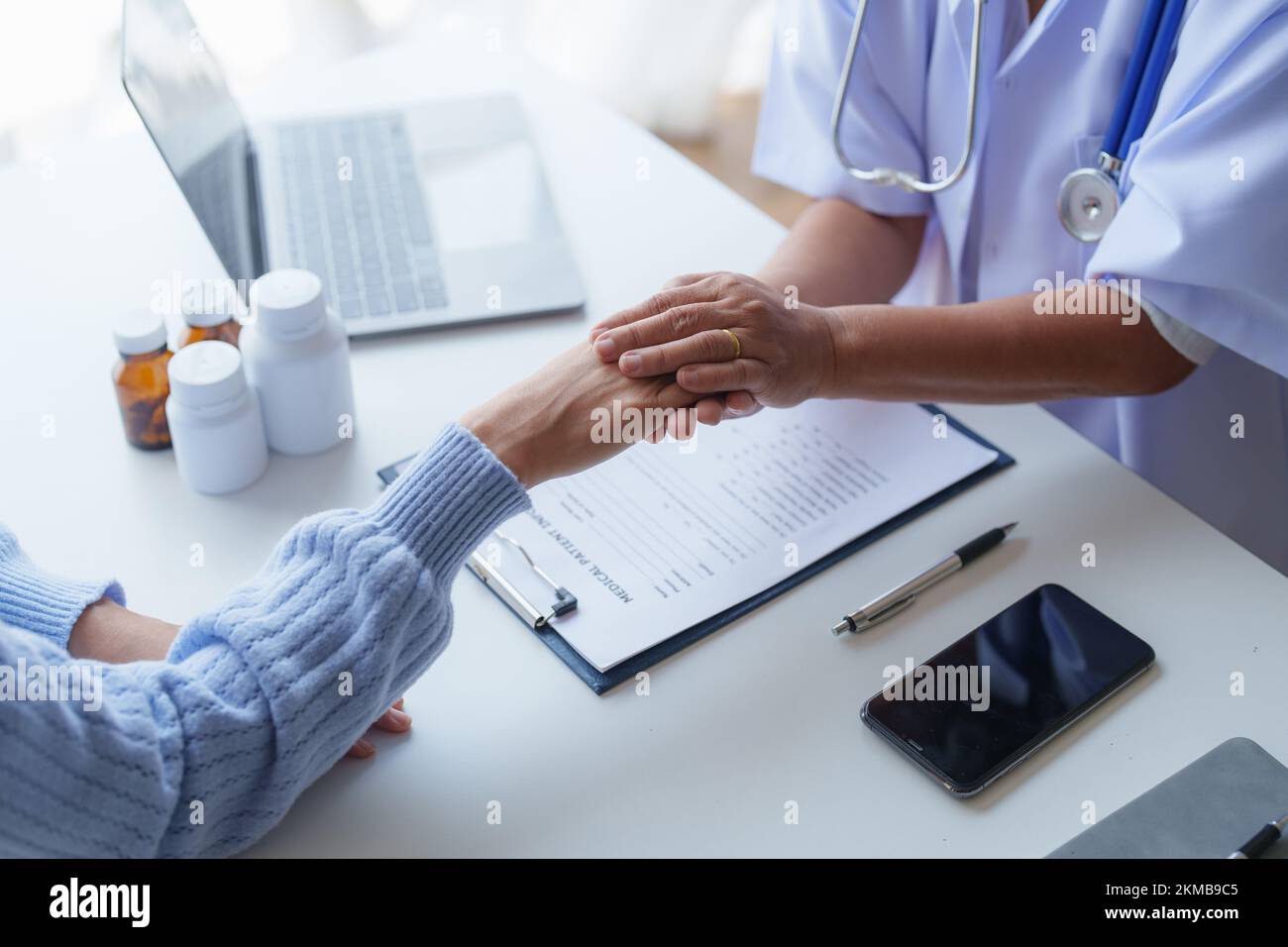 Doctor having conversation with patient while discussing explaining ...