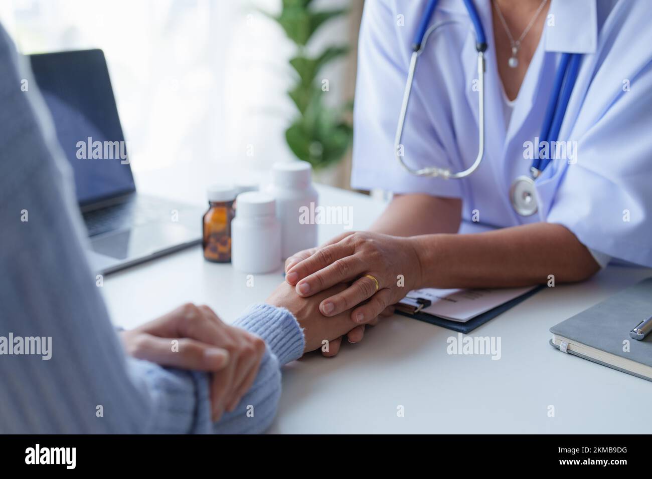 Doctor having conversation with patient while discussing explaining ...