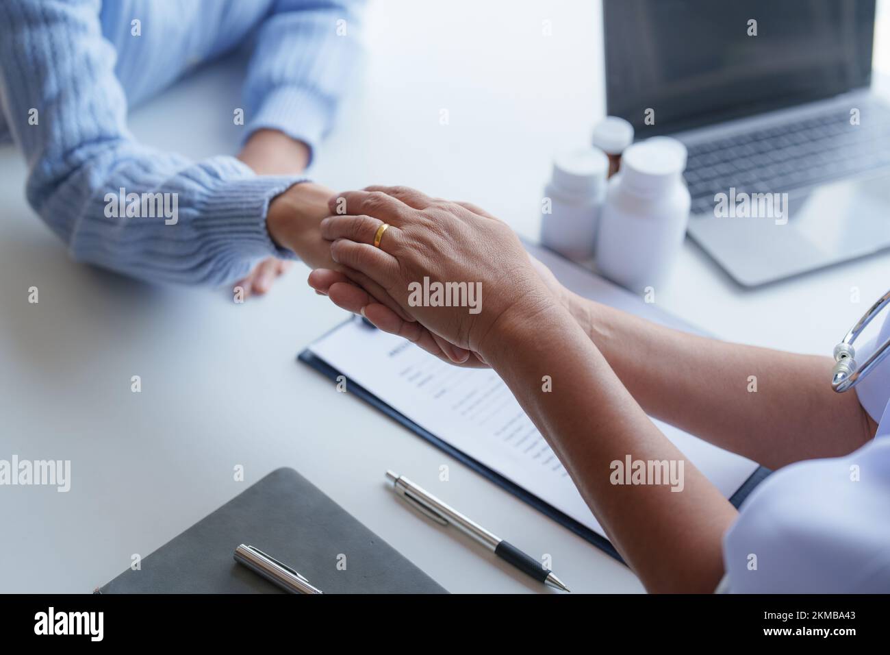 Doctor having conversation with patient while discussing explaining ...