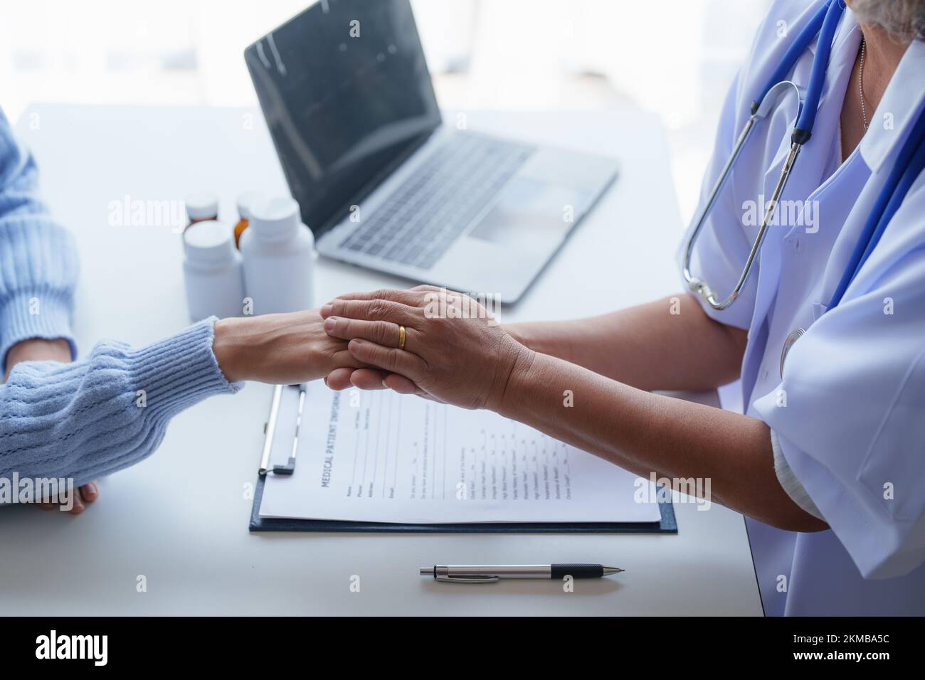 Doctor having conversation with patient while discussing explaining ...