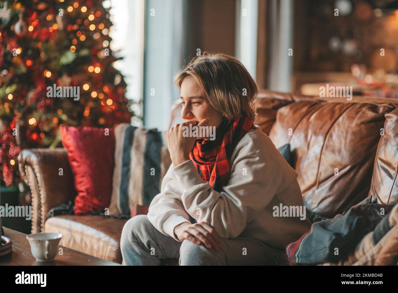 Young emotional cheerful teen boy with long hair laughter and joyful at ...
