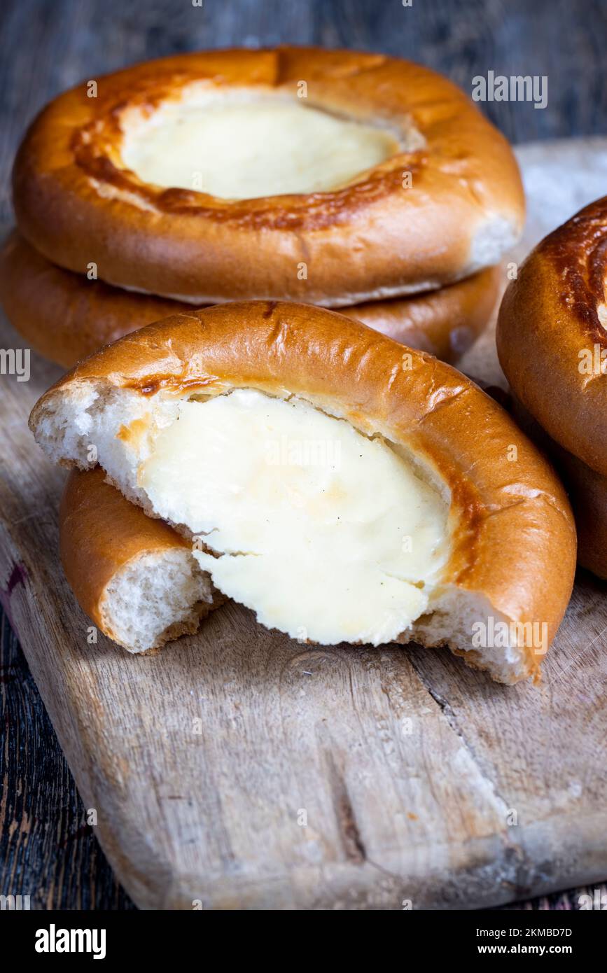 sweet dough pastries with sour cream and milk filling, vanilla sour ...
