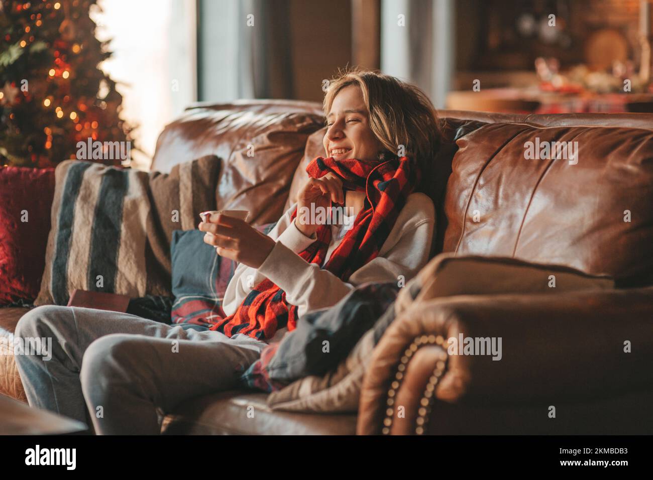 Young emotional cheerful teen boy with long hair laughter and joyful at ...