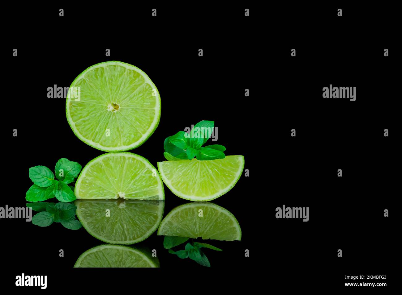 Still life, lemon and lime on black background Stock Photo - Alamy