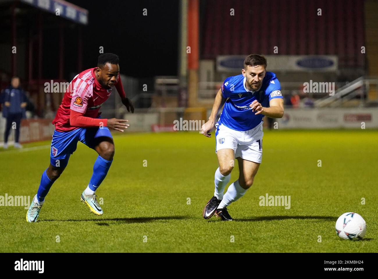 Dagenham and Redbridge's Myles Weston (left) and Gillingham's Robbie ...