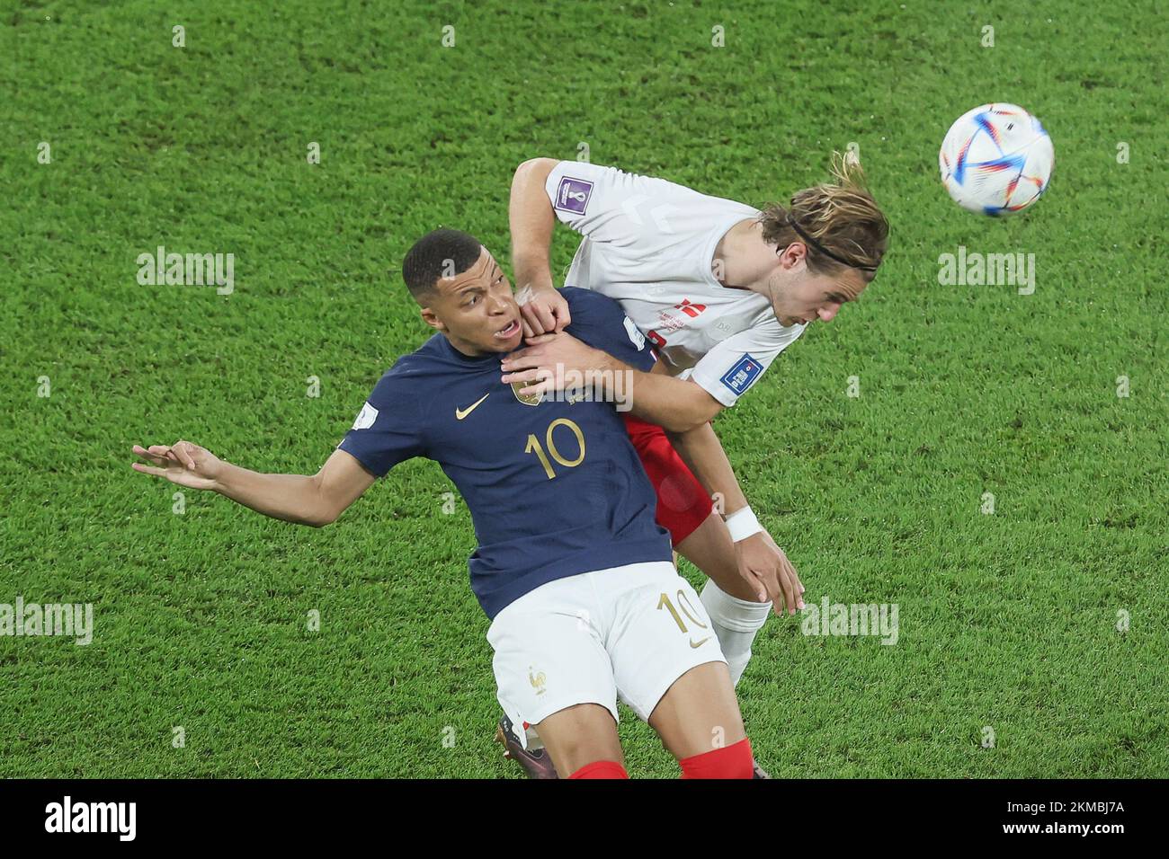 France's Kylian Mbappe and Danish Joachim Andersen fight for the ball ...
