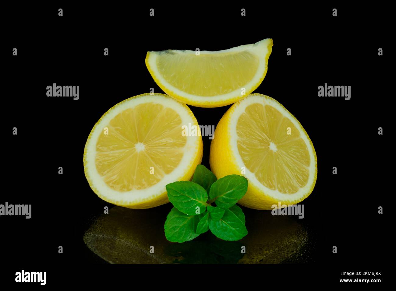 Still life, lemon and lime on black background Stock Photo - Alamy