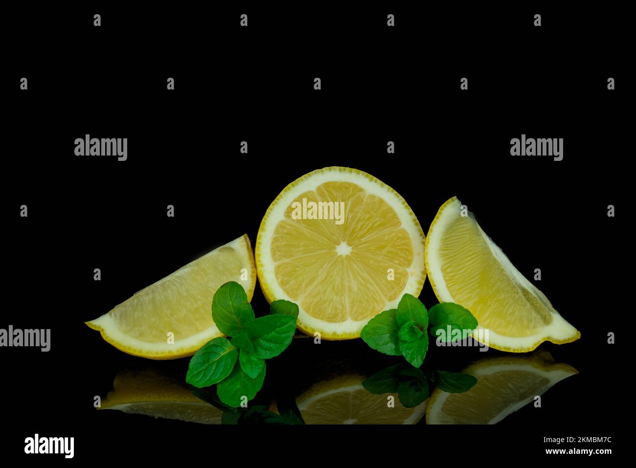 Still life, lemon and lime on black background Stock Photo - Alamy