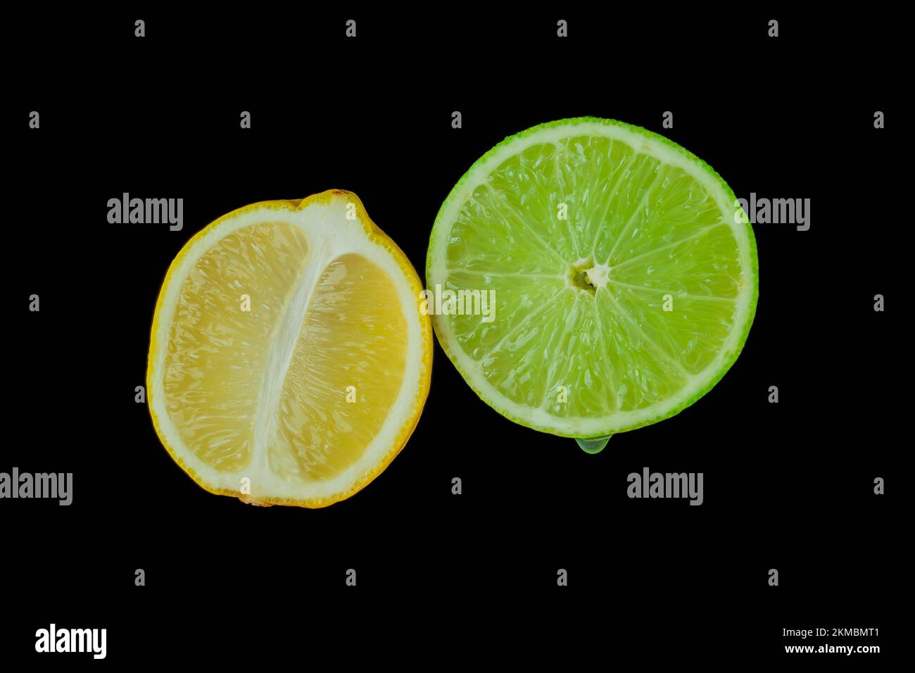 Still life, lemon and lime on black background Stock Photo - Alamy