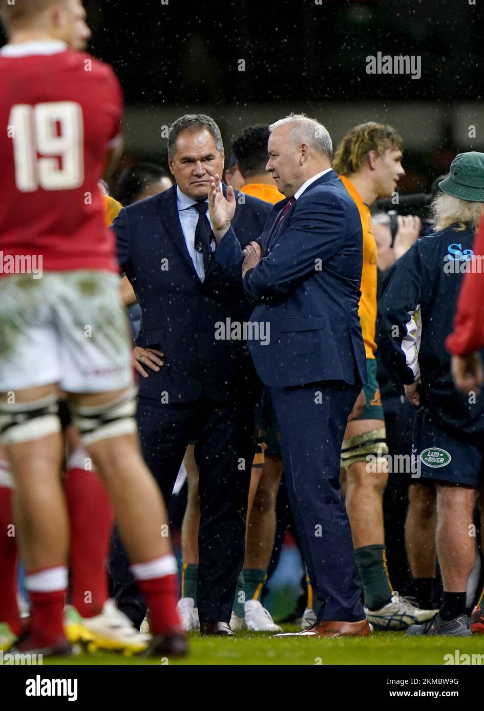 Australia head coach Dave Rennie (centre left) and Wales head coach ...