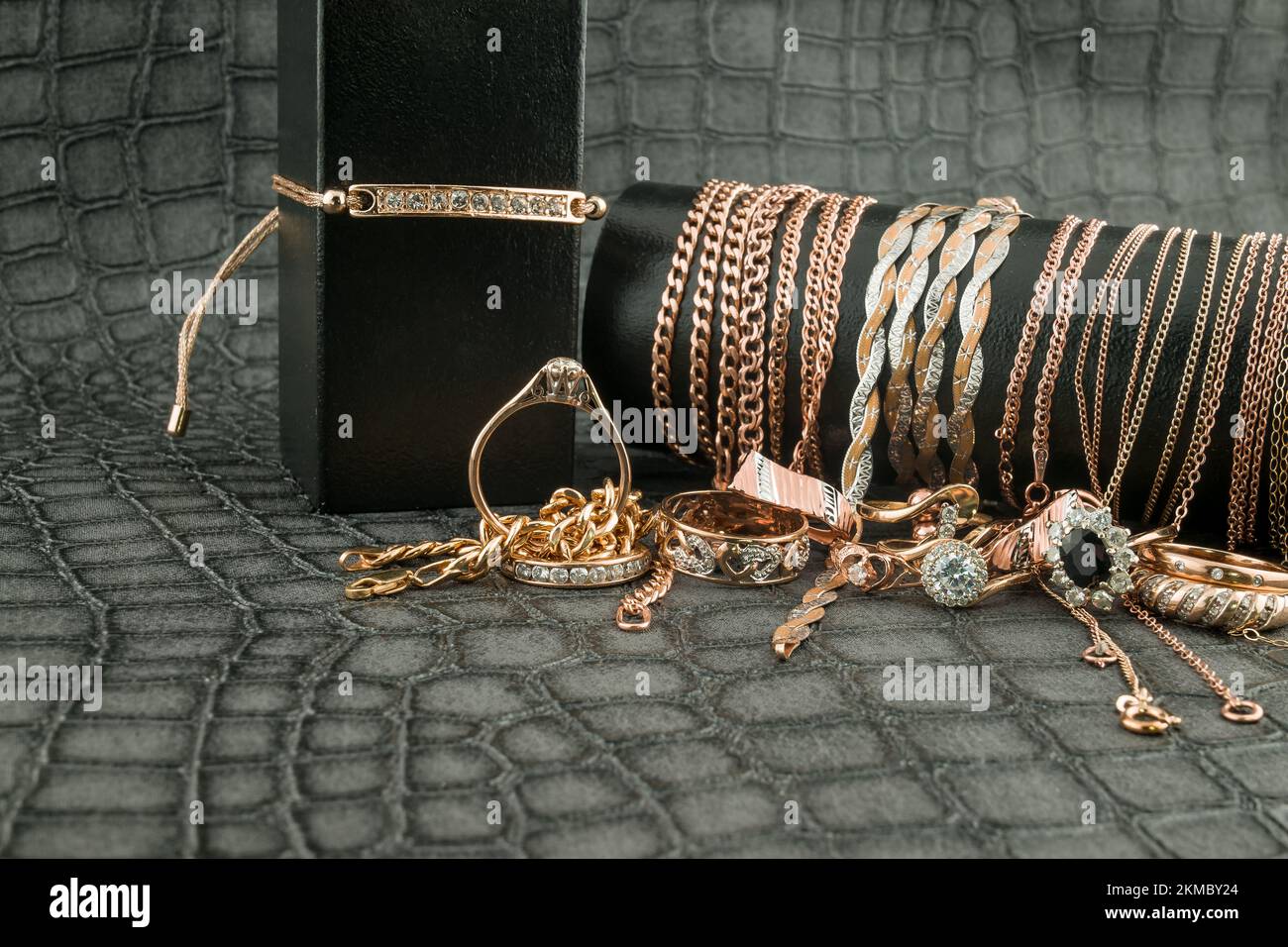 Photo of golden set with gems over dark background Stock Photo - Alamy